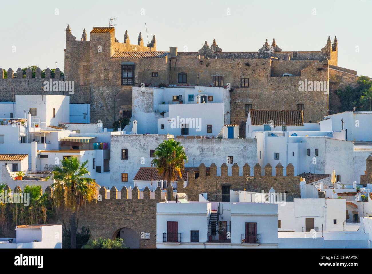 Castle and city walls with white houses, Vejer de la Frontera, Cadiz ...