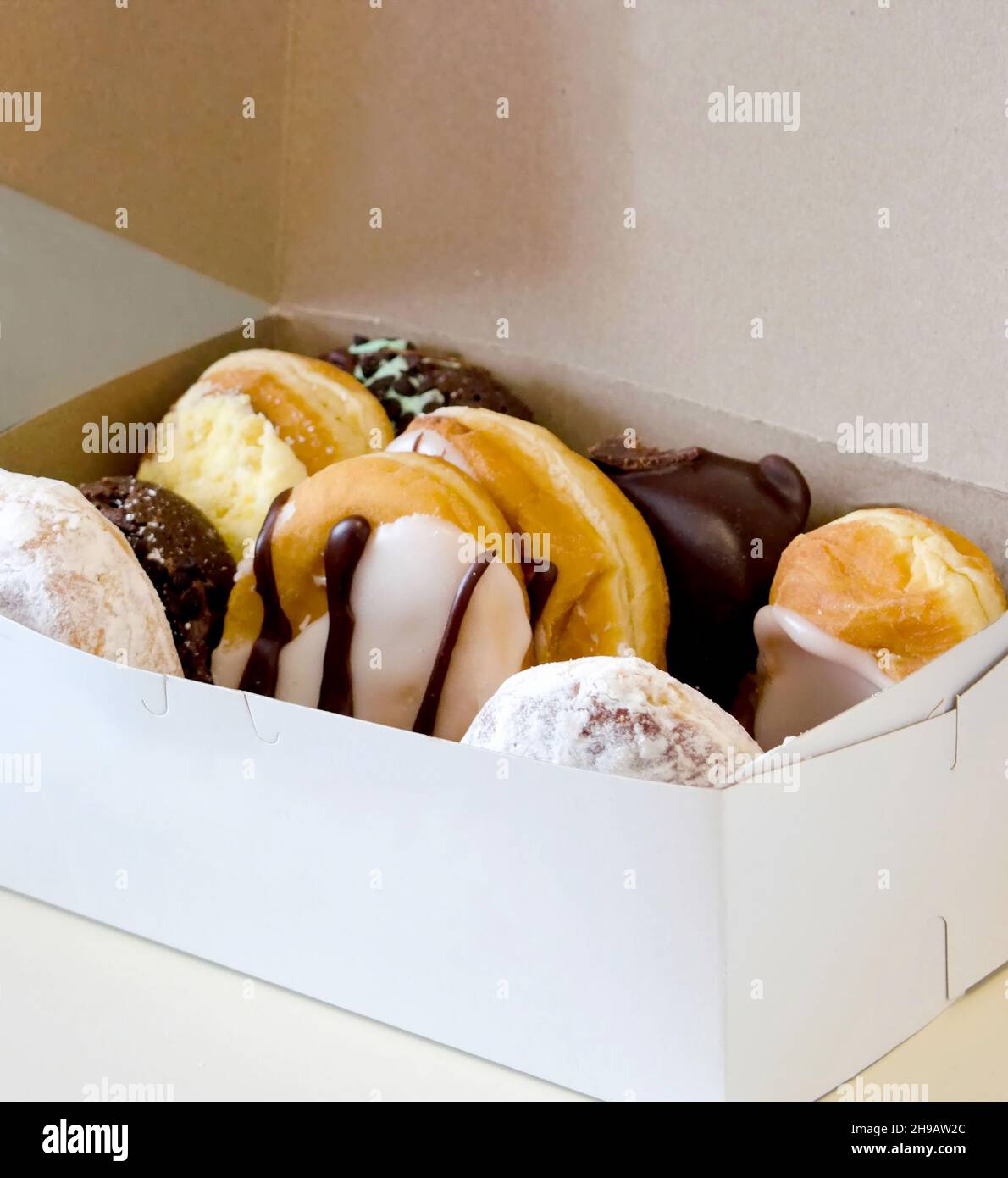 Box of donuts in a variety of flavors Stock Photo - Alamy