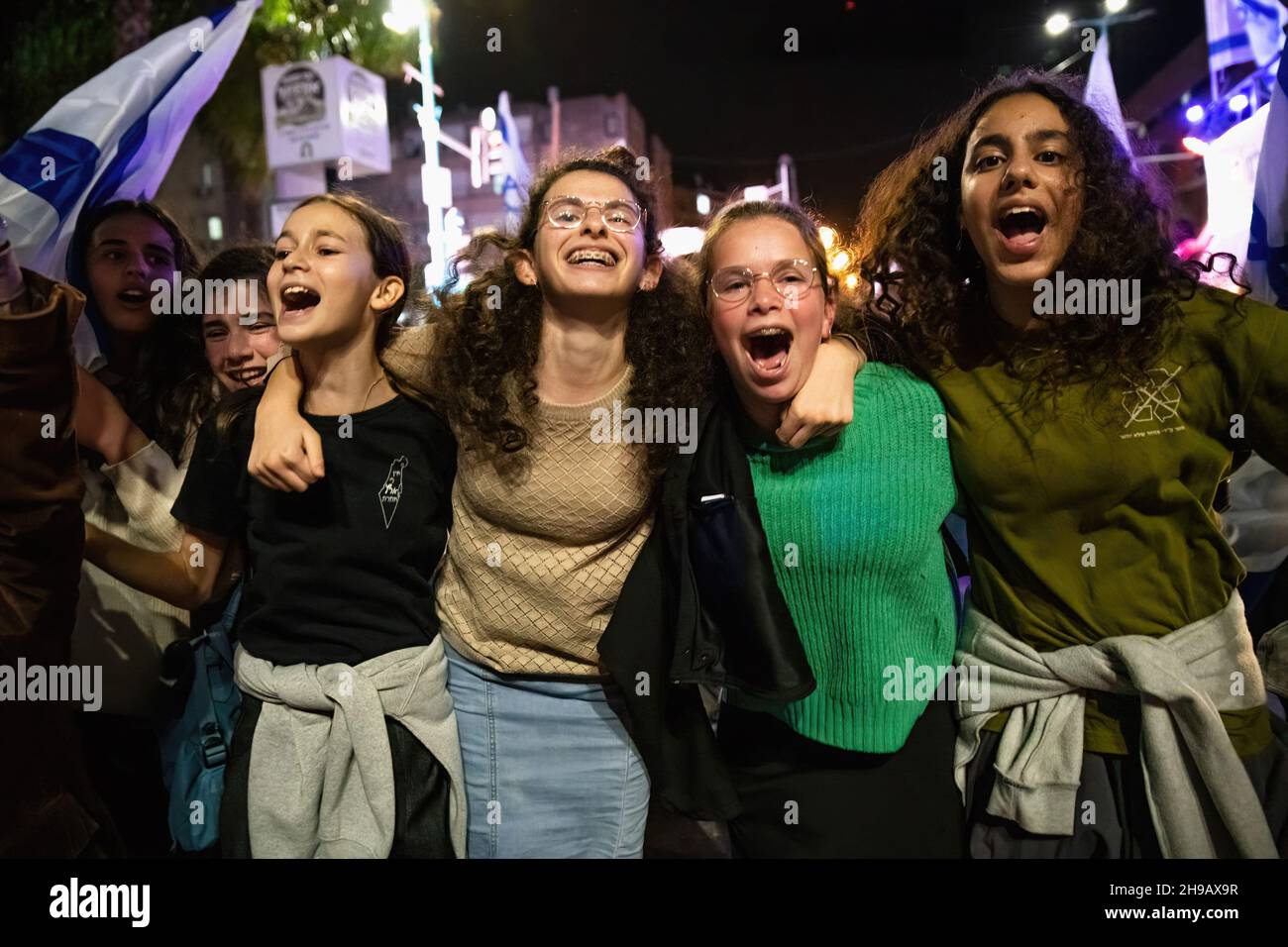 Participants are seen singing during the celebrations. Israeli ...