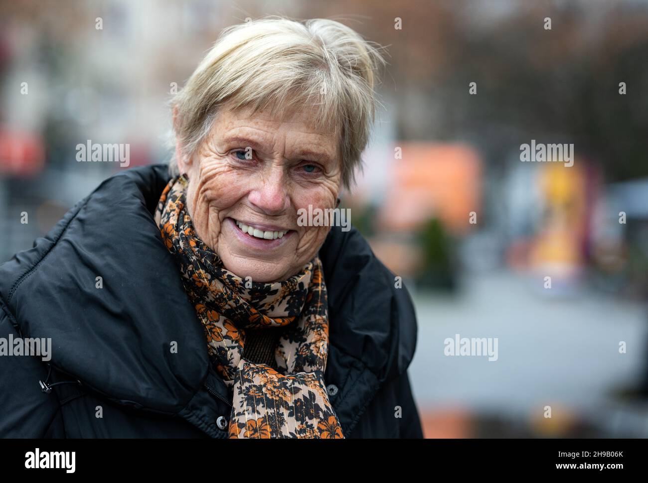 Berlin, Germany. 30th Nov, 2021. Ute Henkel stands in a pedestrian zone ...