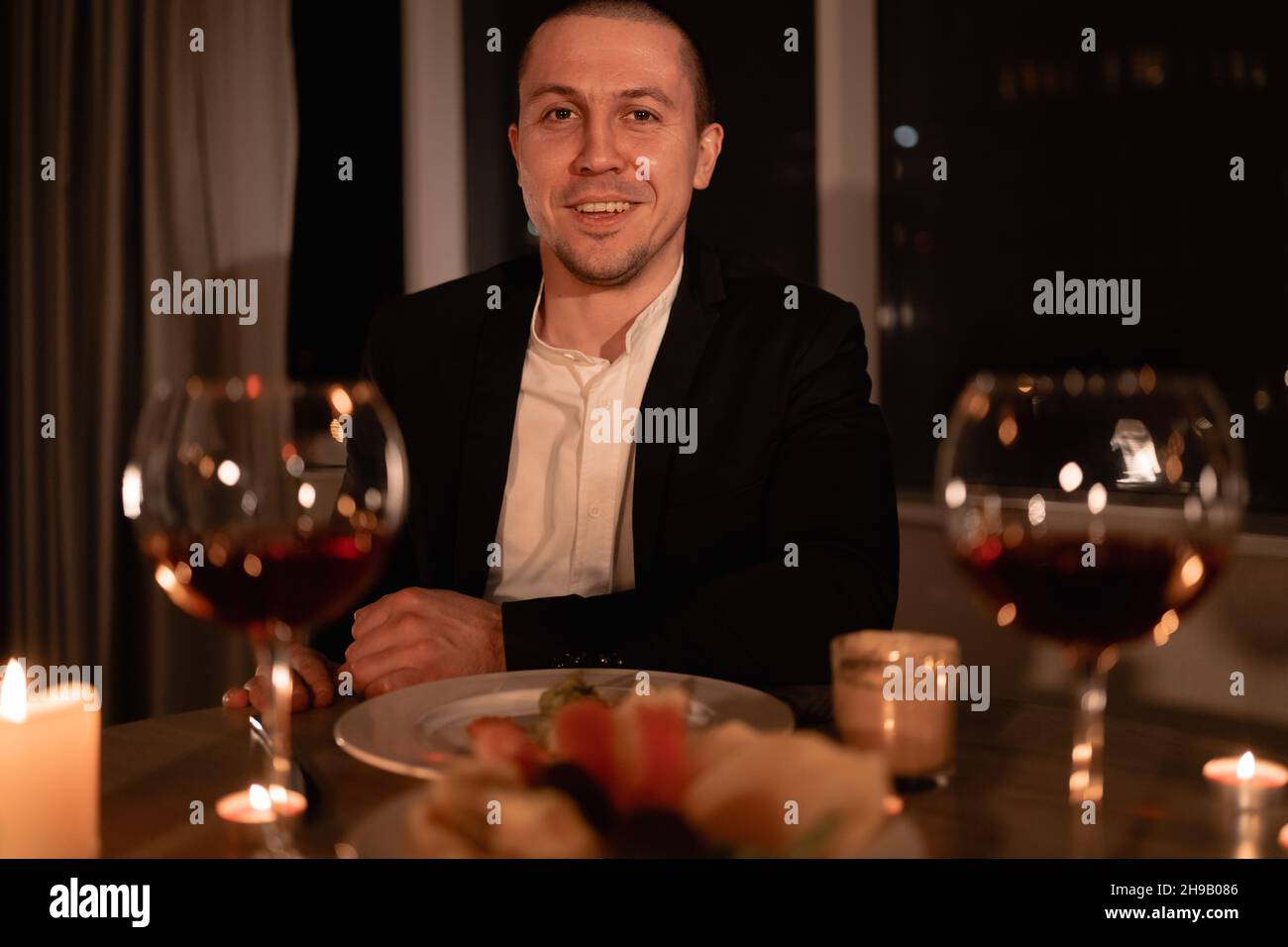 Stylish family dinner hi-res stock photography and images - Alamy