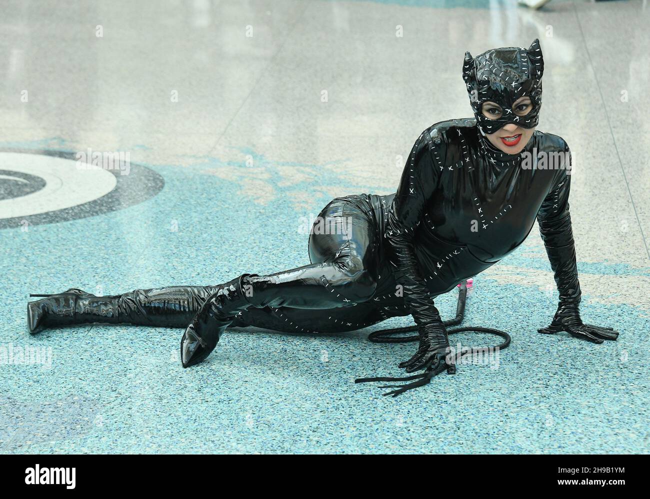 Los Angeles, USA. 05th Dec, 2021. A cosplayer as Catwoman poses on the ...