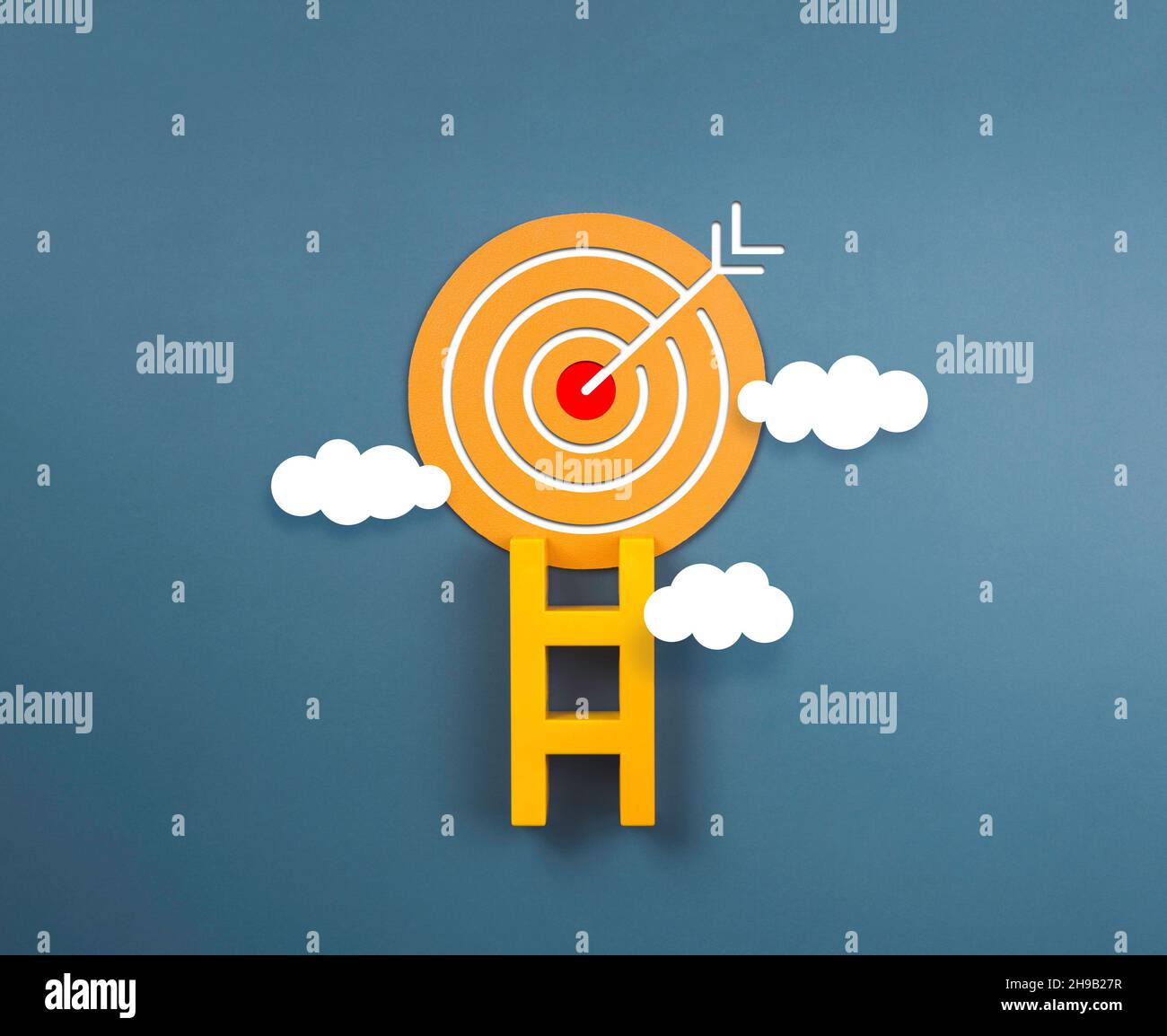 The big goal target icon symbol is on a yellow ladder and white clouds ...