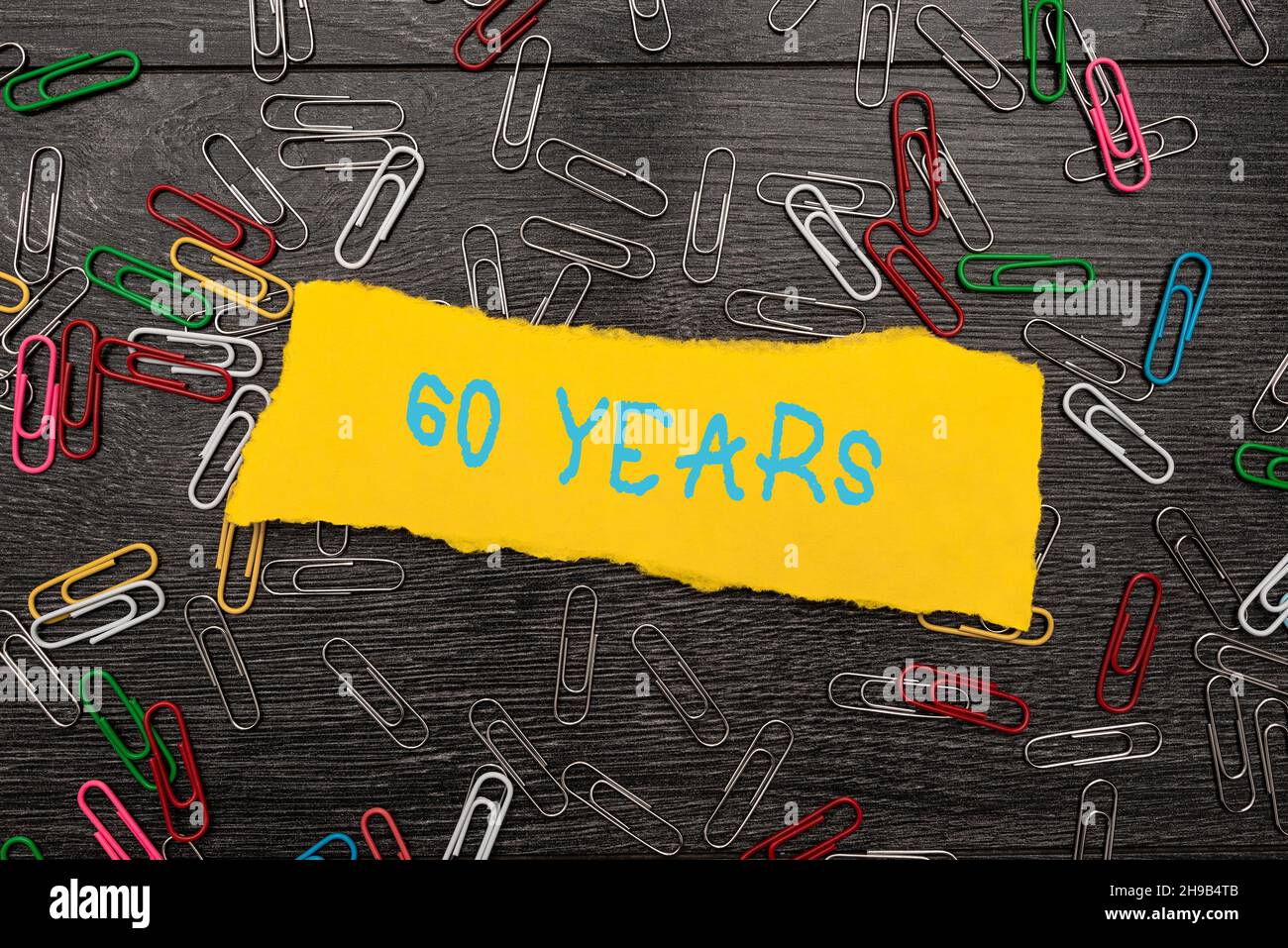 Sign displaying 60 Years. Word for It is the onset of a golden era ...