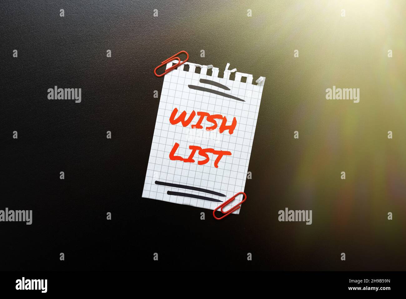 Hand writing sign Wish List. Word Written on List of desired but often ...