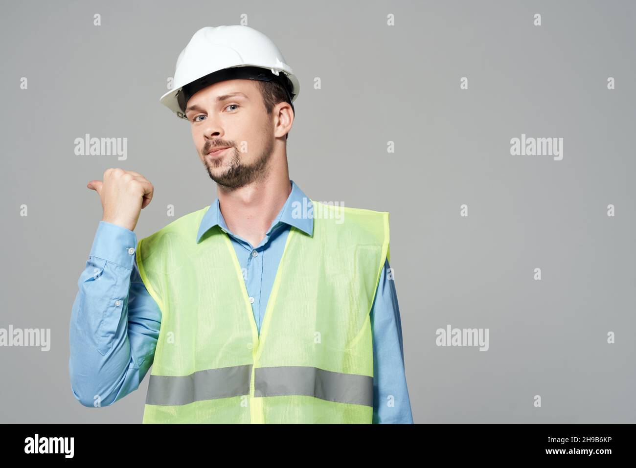 Man in working form construction work isolated background Stock Photo ...