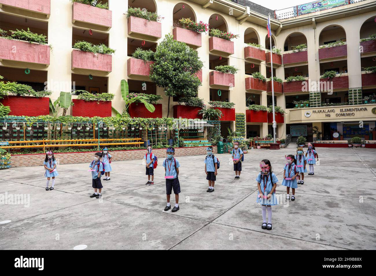 December 6, 2021: Students observe physical distancing as they start to ...