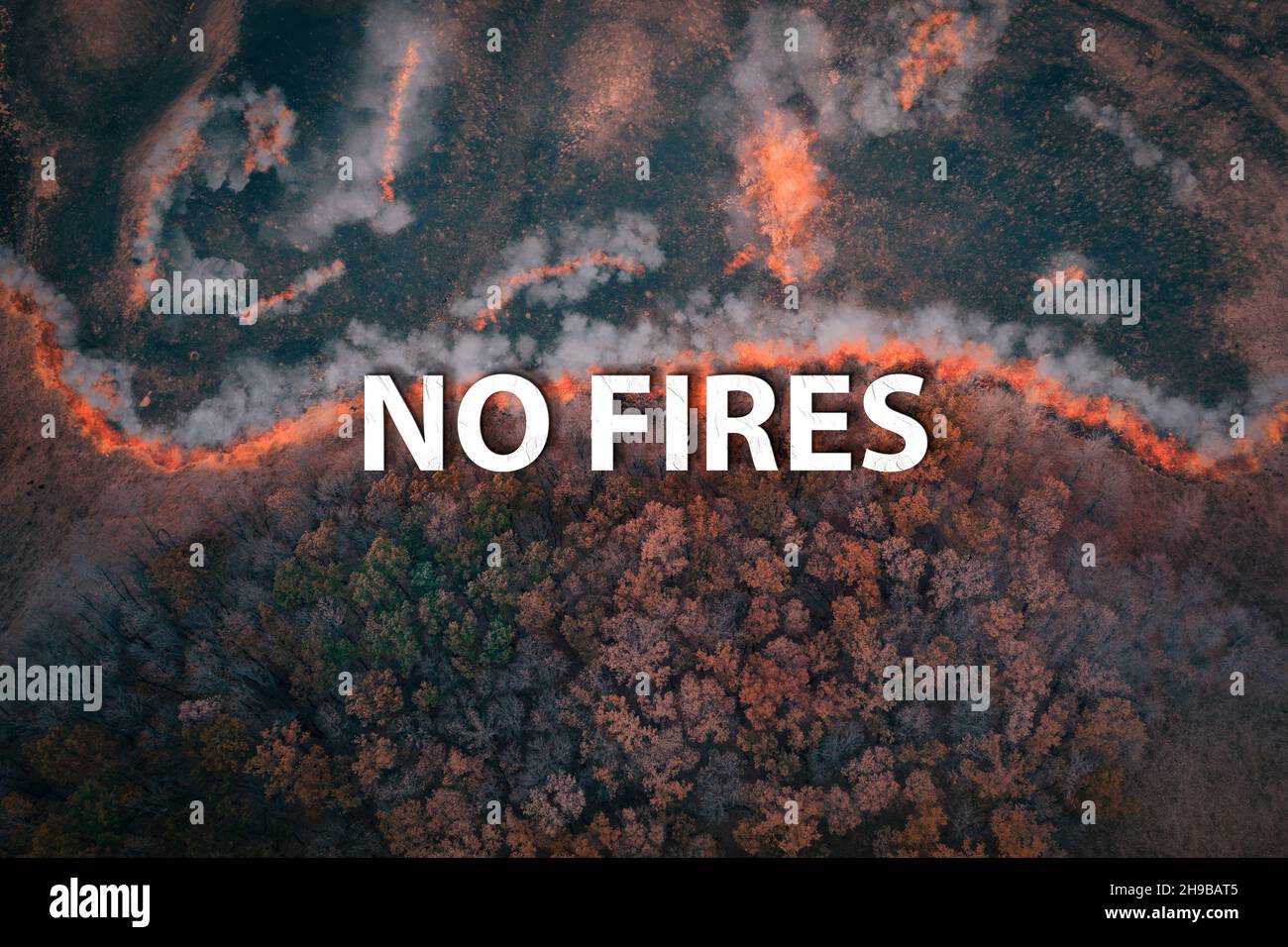 No Fires sign on Forest fire background: fire with smoke. Aerial Top ...