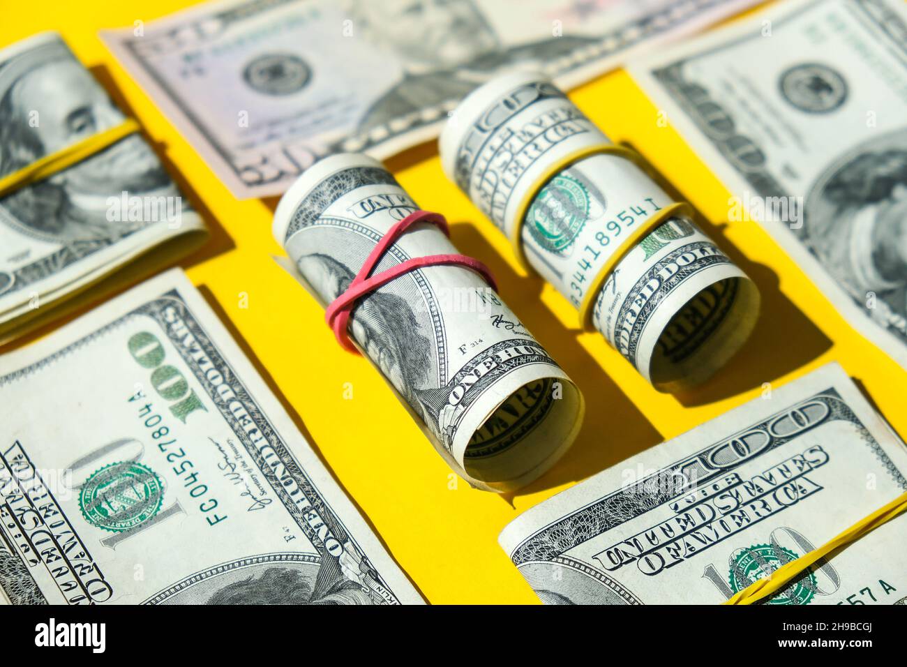 US dollars bundle close up isolated on dollar background. Paper ...