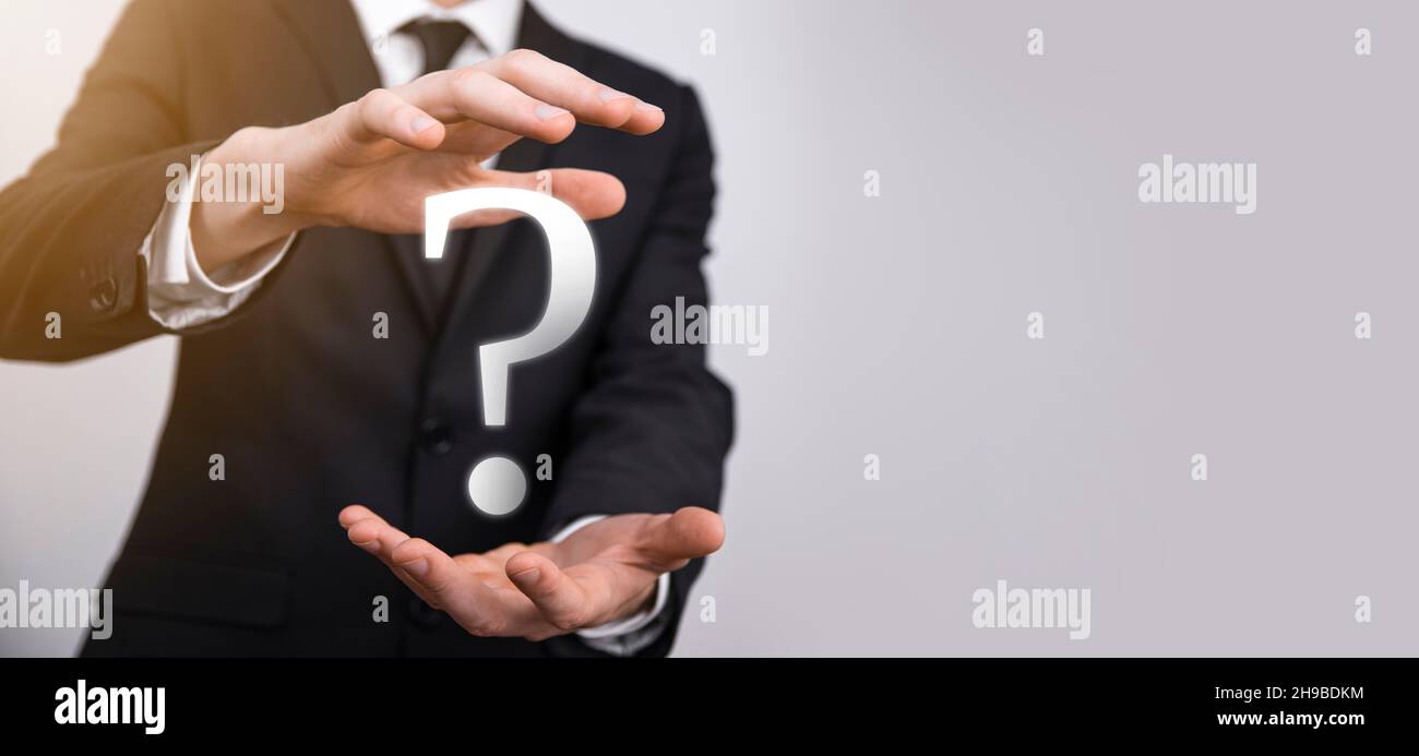 Businessman man hand hold interface question marks sign web. Ask ...
