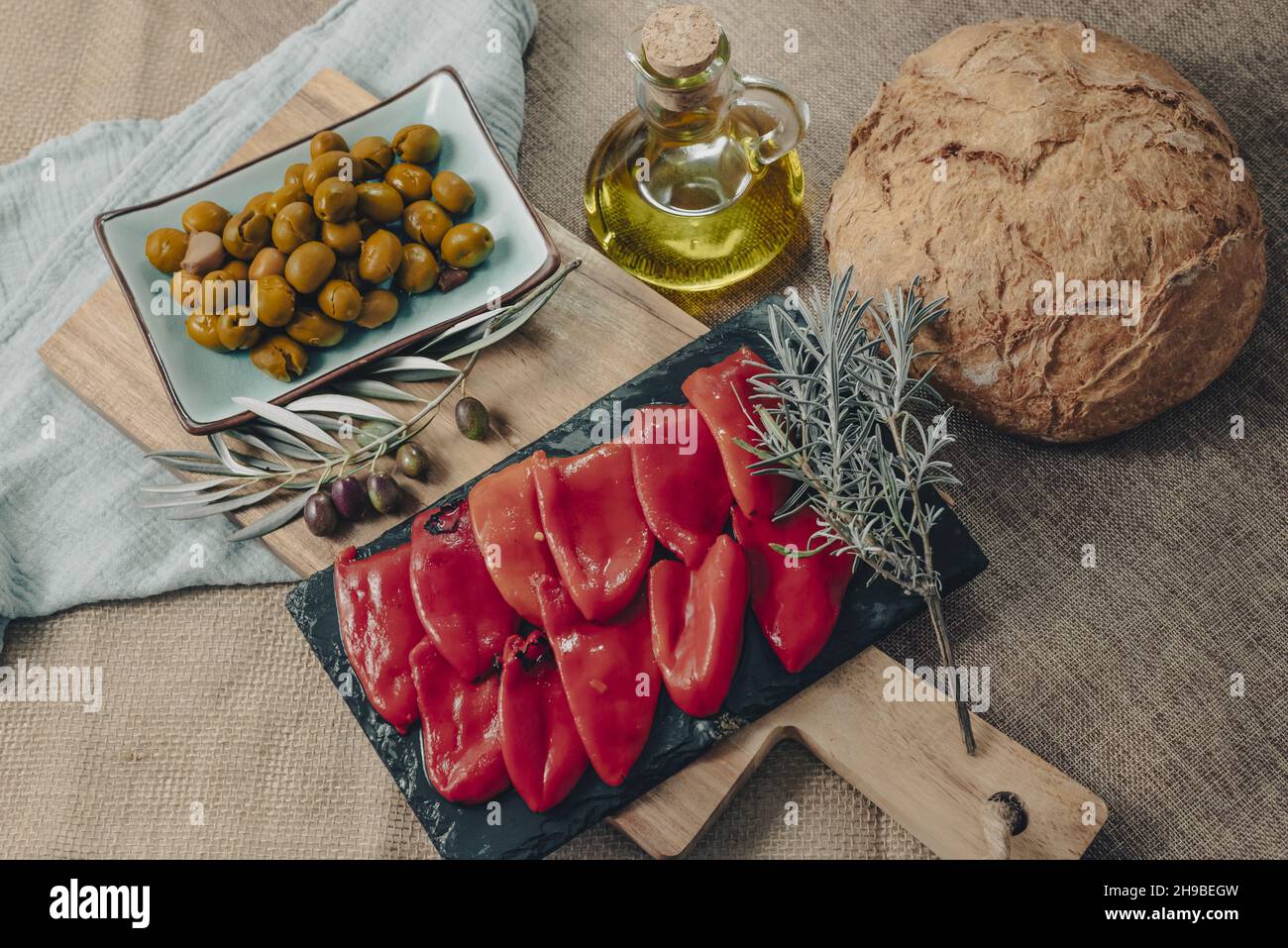 Tapas on Crusty Bread - Selection of Spanish tapas served on a sliced ...