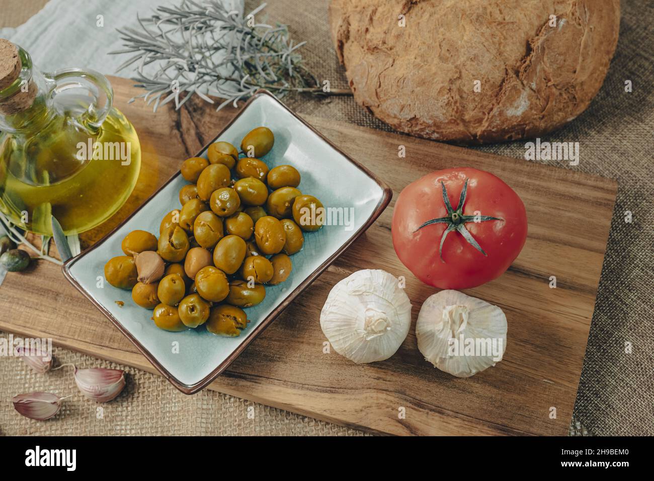 Tapas on Crusty Bread - Selection of Spanish tapas served on a sliced ...