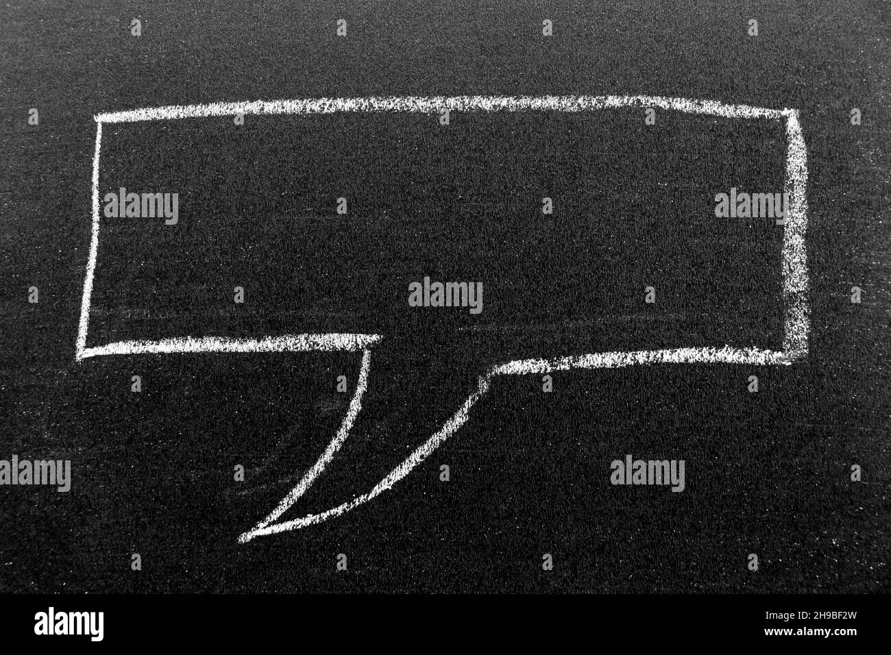 White color chalk hand drawing in square bubble speech shape with blank ...