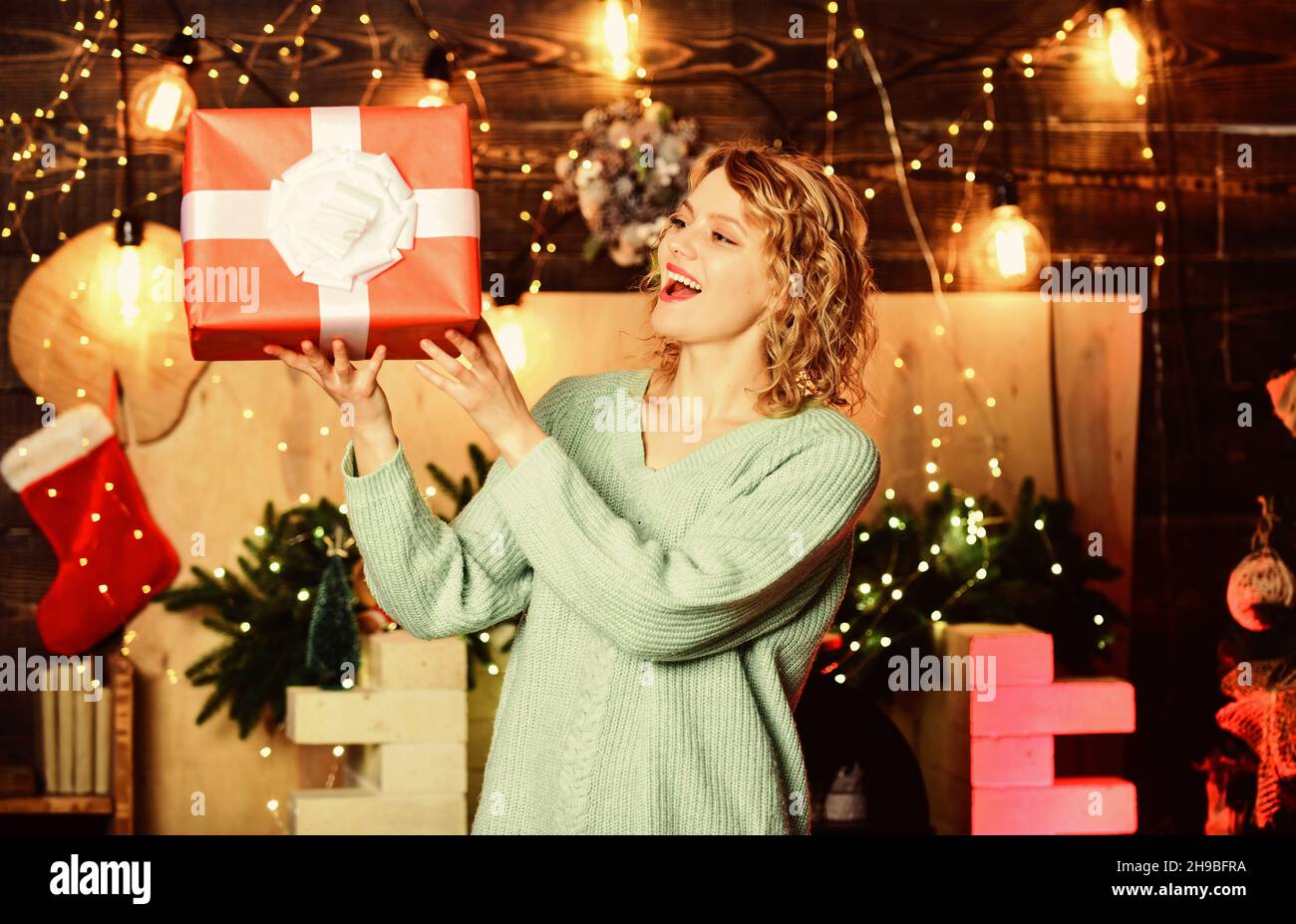 Christmas composition. happy new year. Celebrating xmas with family. girl present box. cheerful ...