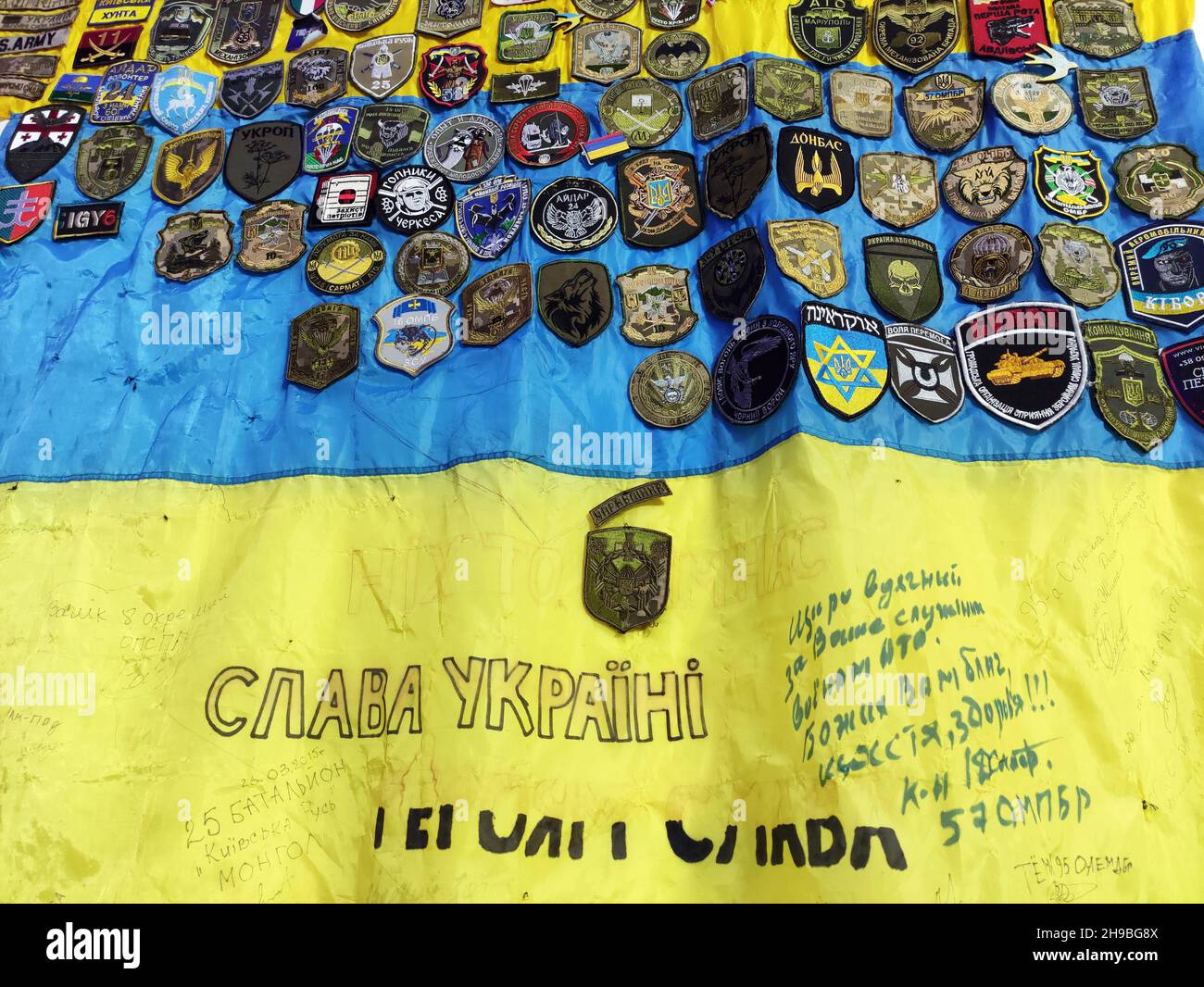 KYIV, UKRAINE - DECEMBER 5, 2021 - Shoulder sleeve insignia are pinned ...