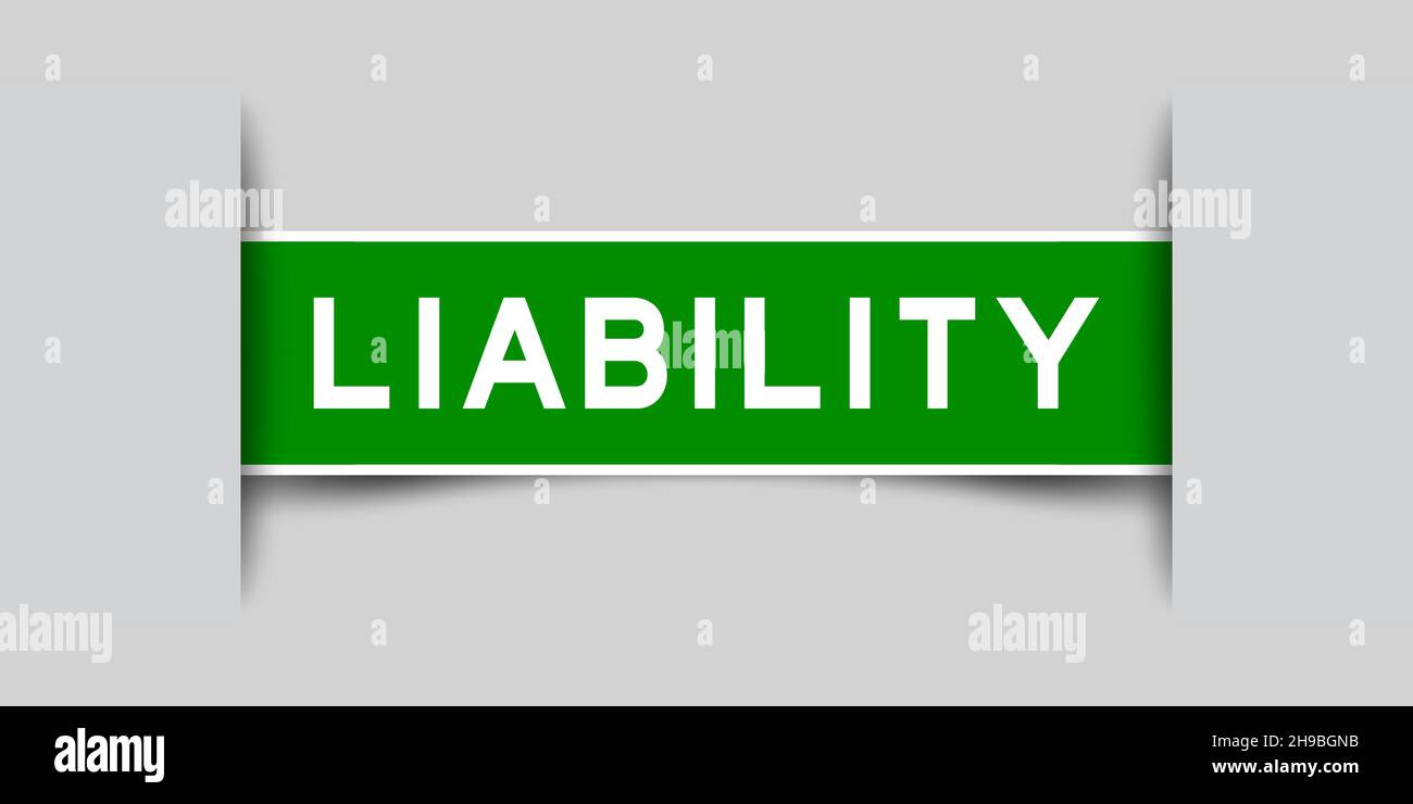 Inserted green color label sticker with word liability on gray ...