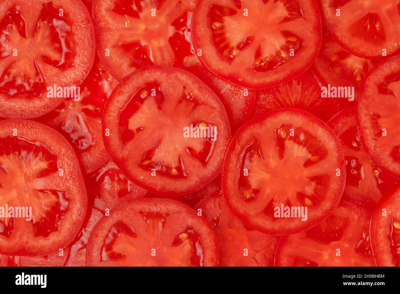 Pattern of sliced tomato, close up Stock Photo - Alamy