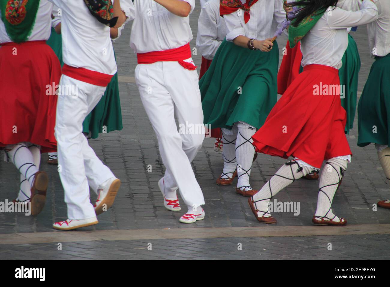 Basque woman in traditional green hi-res stock photography and images ...