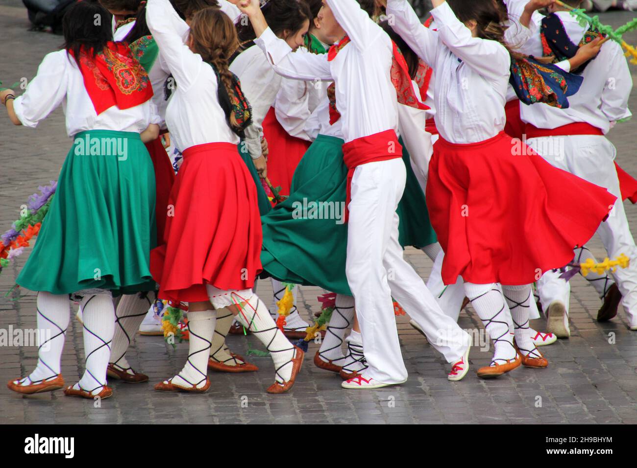 Basque woman in traditional green hi-res stock photography and images ...