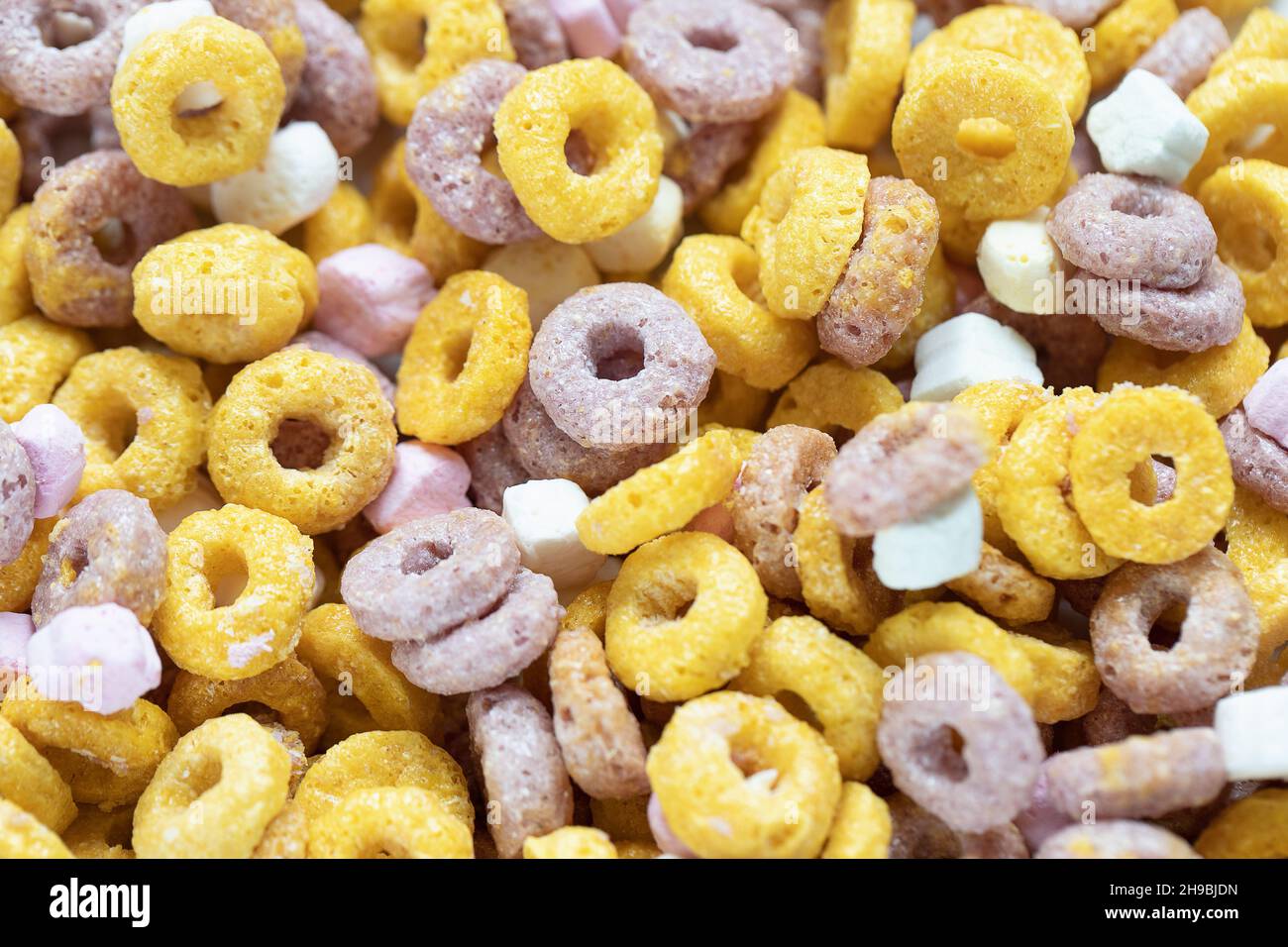 Multi colored cereal fruit loops food background. Closeup. Breakfast ...