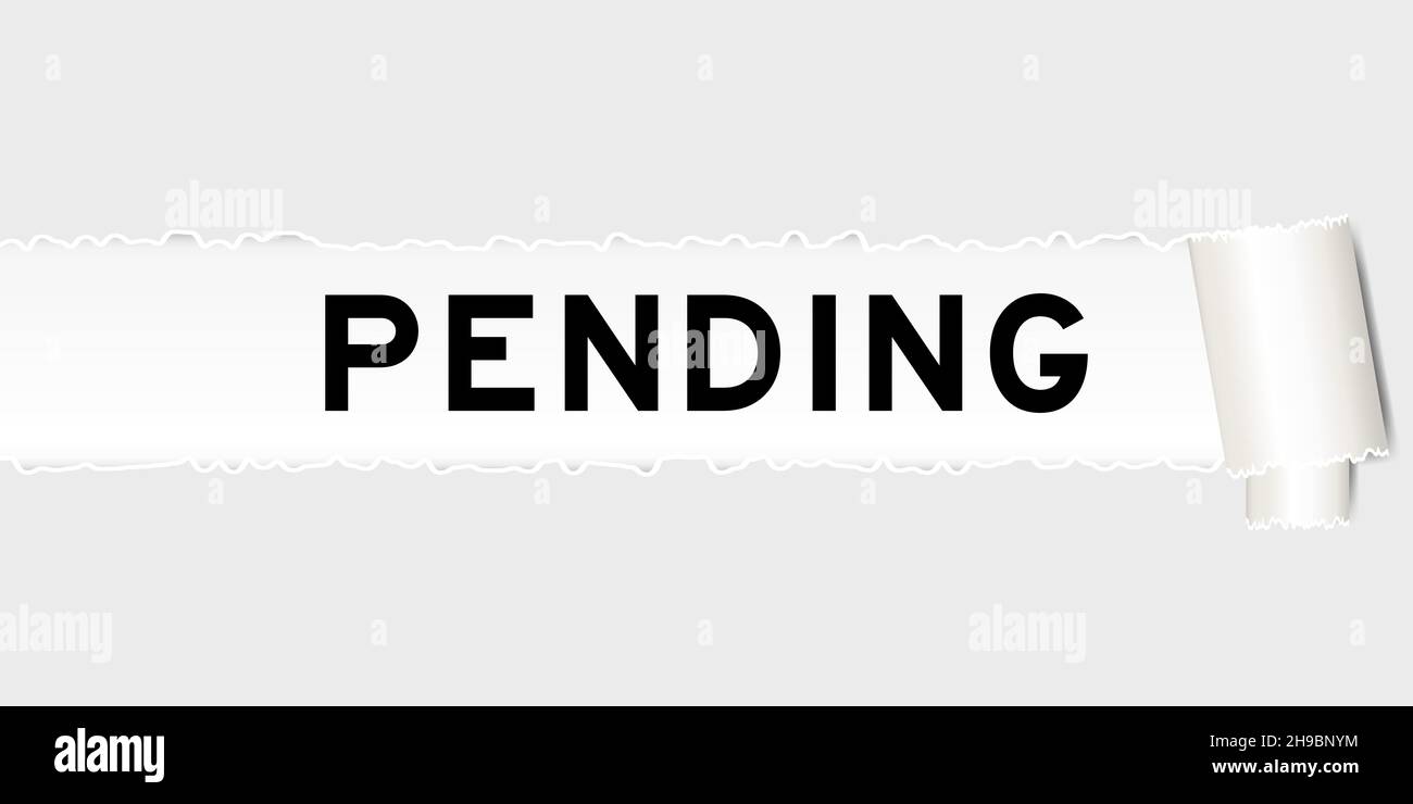 Ripped gray paper background that have word pending under torn part ...