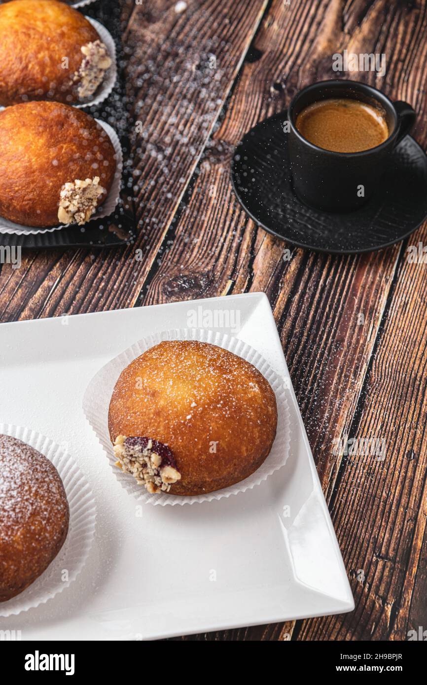 Bombolone or bomboloni is an Italian filled donut and snack food ...
