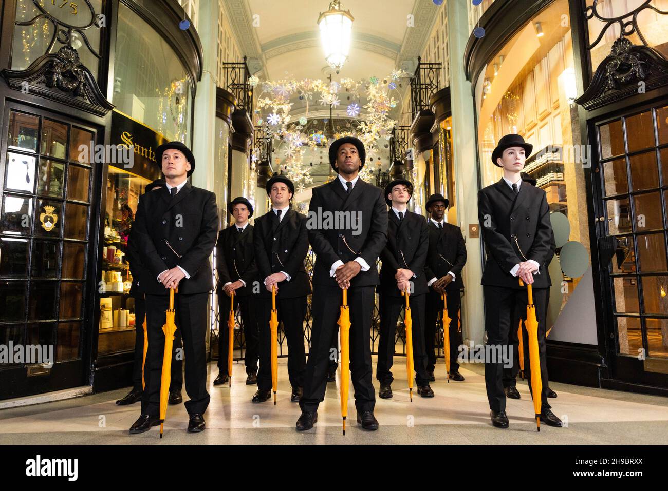 EDITORIAL USE ONLY Actors dressed as 'spies from the early 1900s', in 3 ...