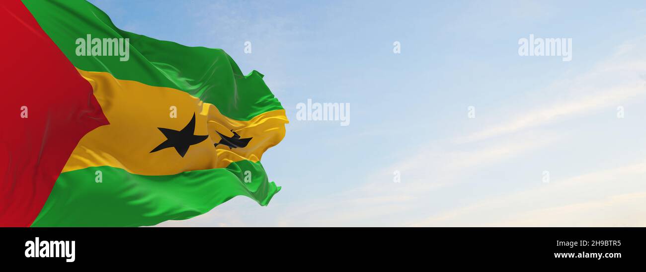 official flag of Congo Kinshasa at cloudy sky background on sunset ...