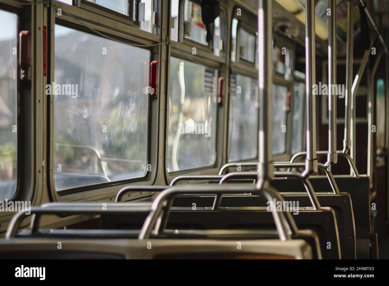 Interior of an empty public transport - retro style Stock Photo - Alamy