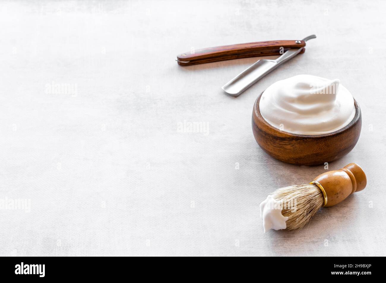 Barbar shop equipment for shaving with razor and foam Stock Photo - Alamy