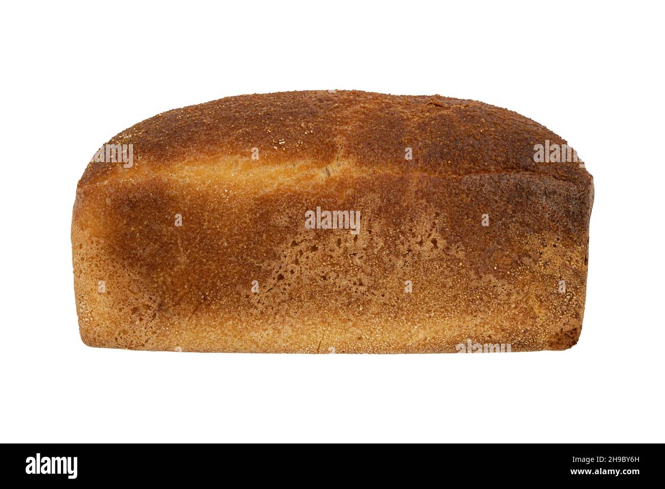 loaf of golden wheat bread brick isolated on white background, homemade ...