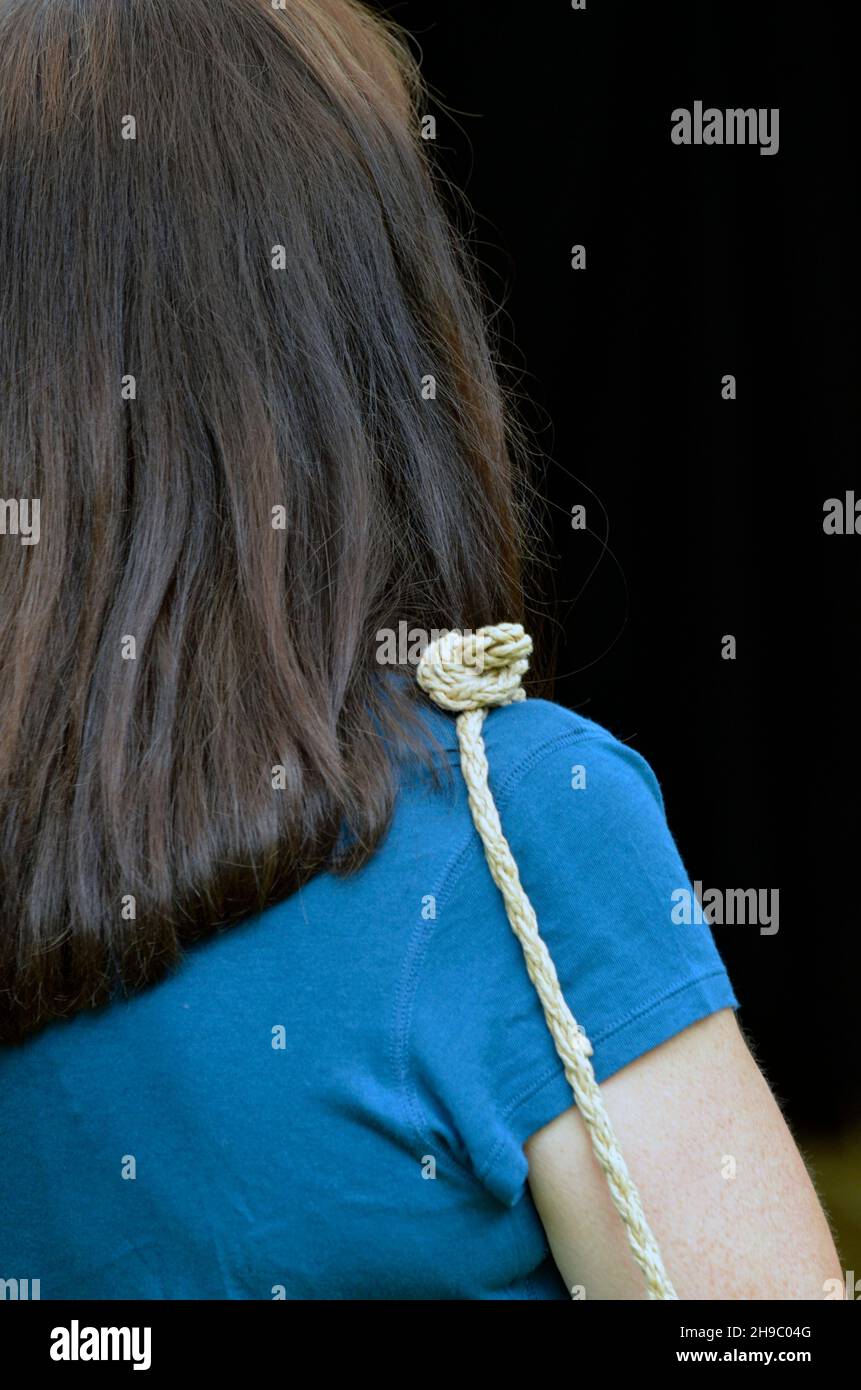 Hanging off rope hi-res stock photography and images - Alamy