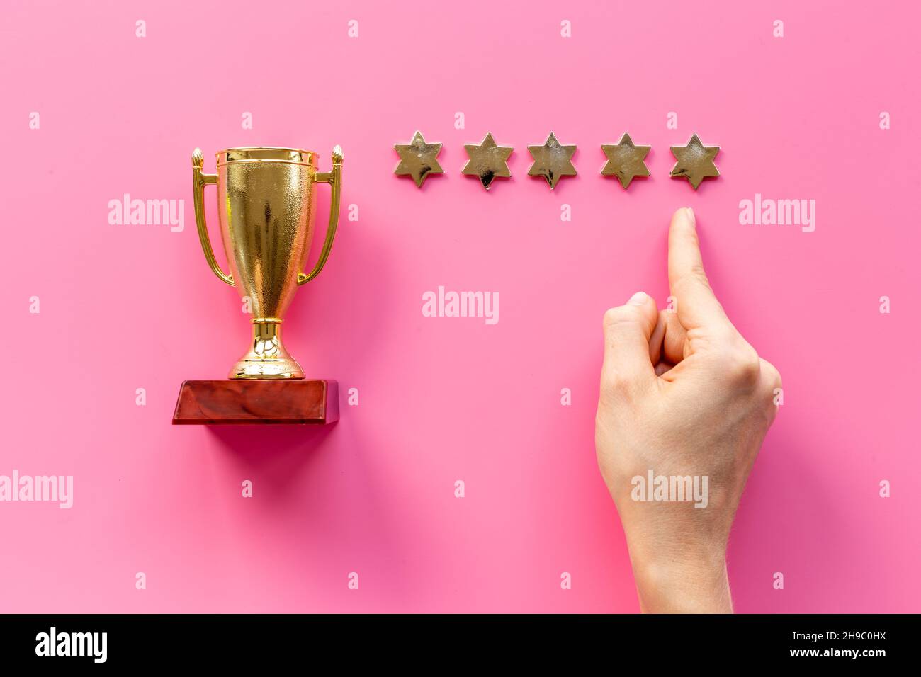 Five stars rating and winner trophy cup. Award and success concept ...