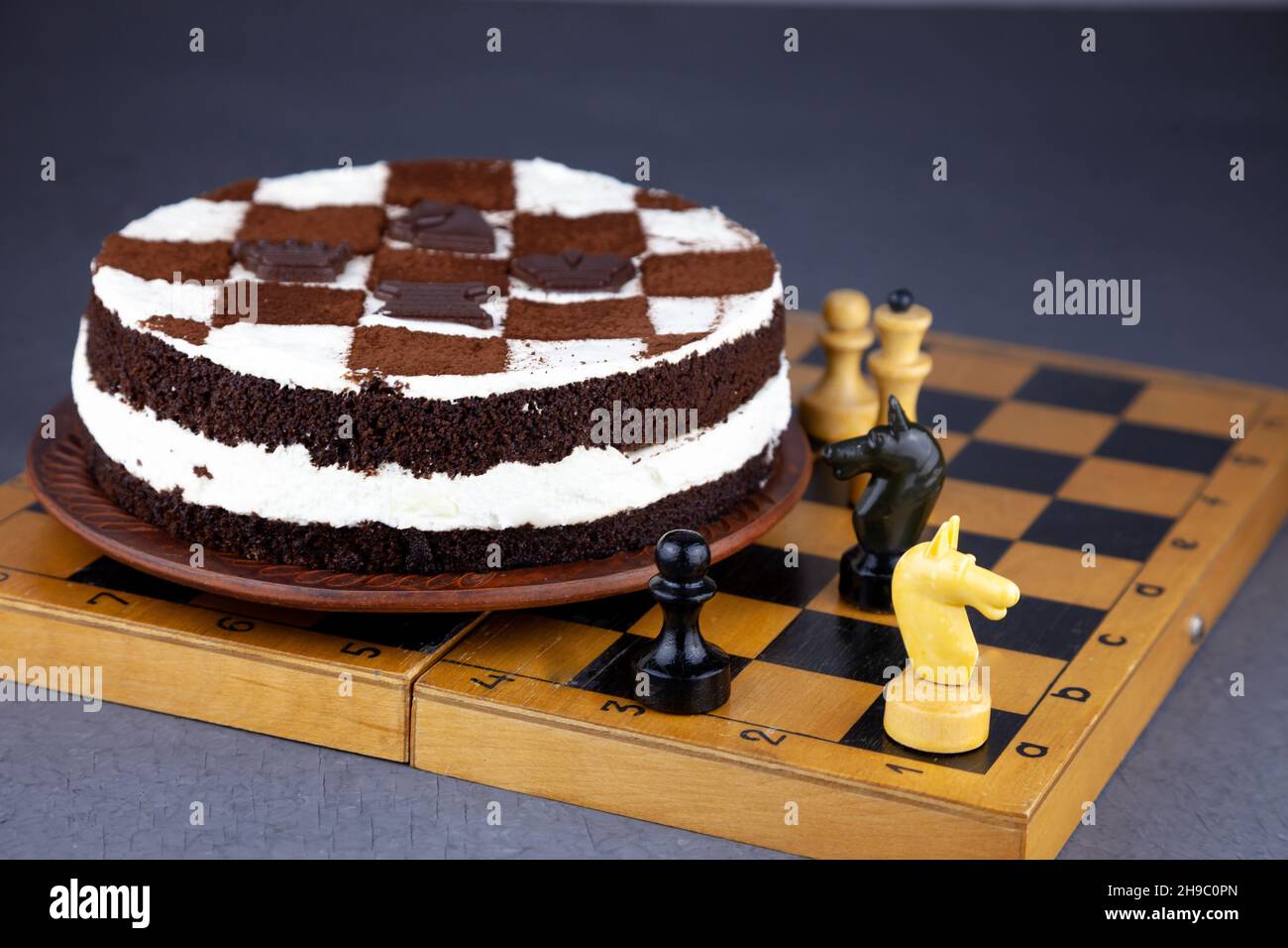 Sponge cake with butter cream. Cake in the form of a chessboard. A gift ...