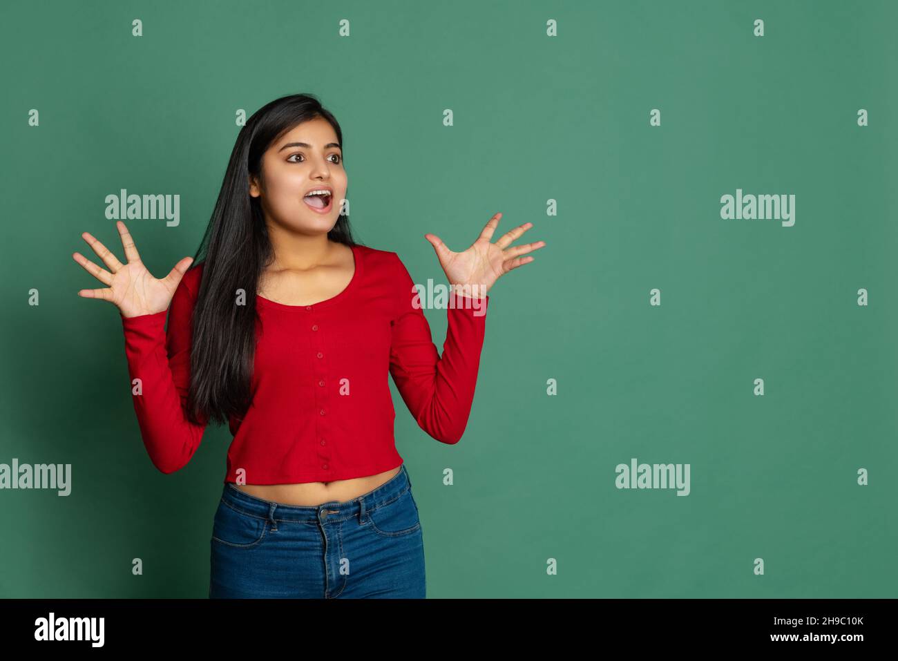 Exicted young adorable cute girl, student in casual style clothes ...