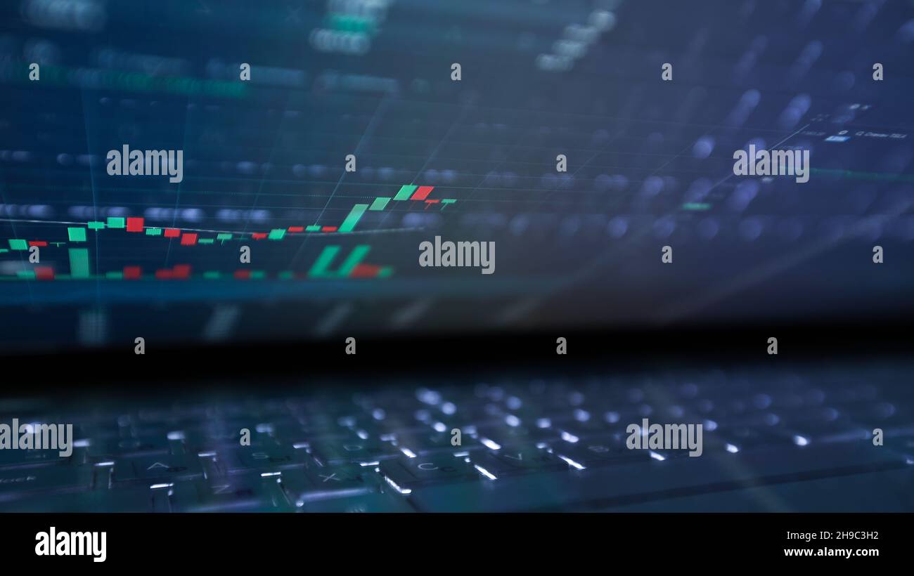 Laptop screen with stock market charts. Technical analysis and ...