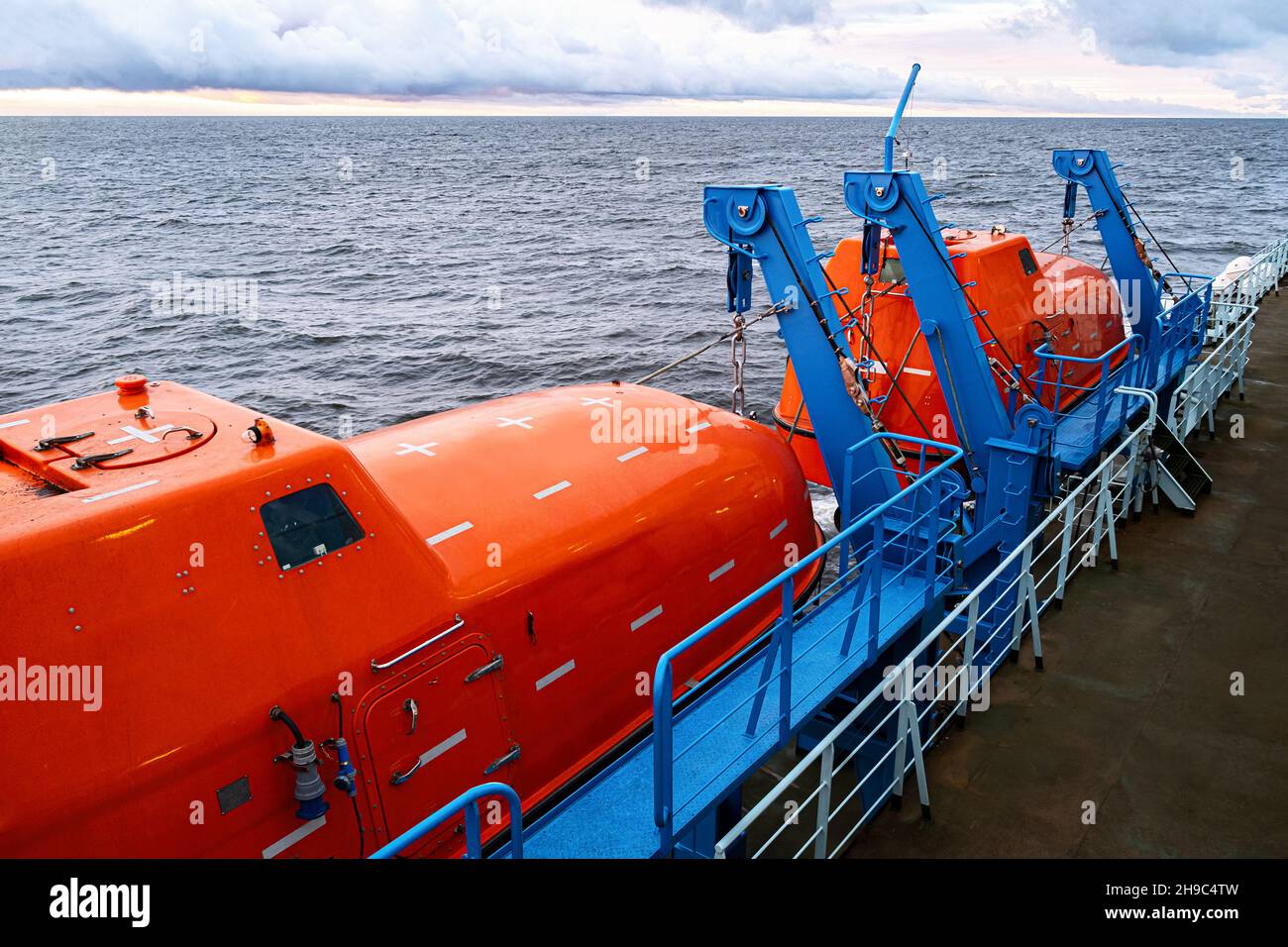 Multifunctional orange enclosed lifeboat, cargo ship lifeboat Stock ...
