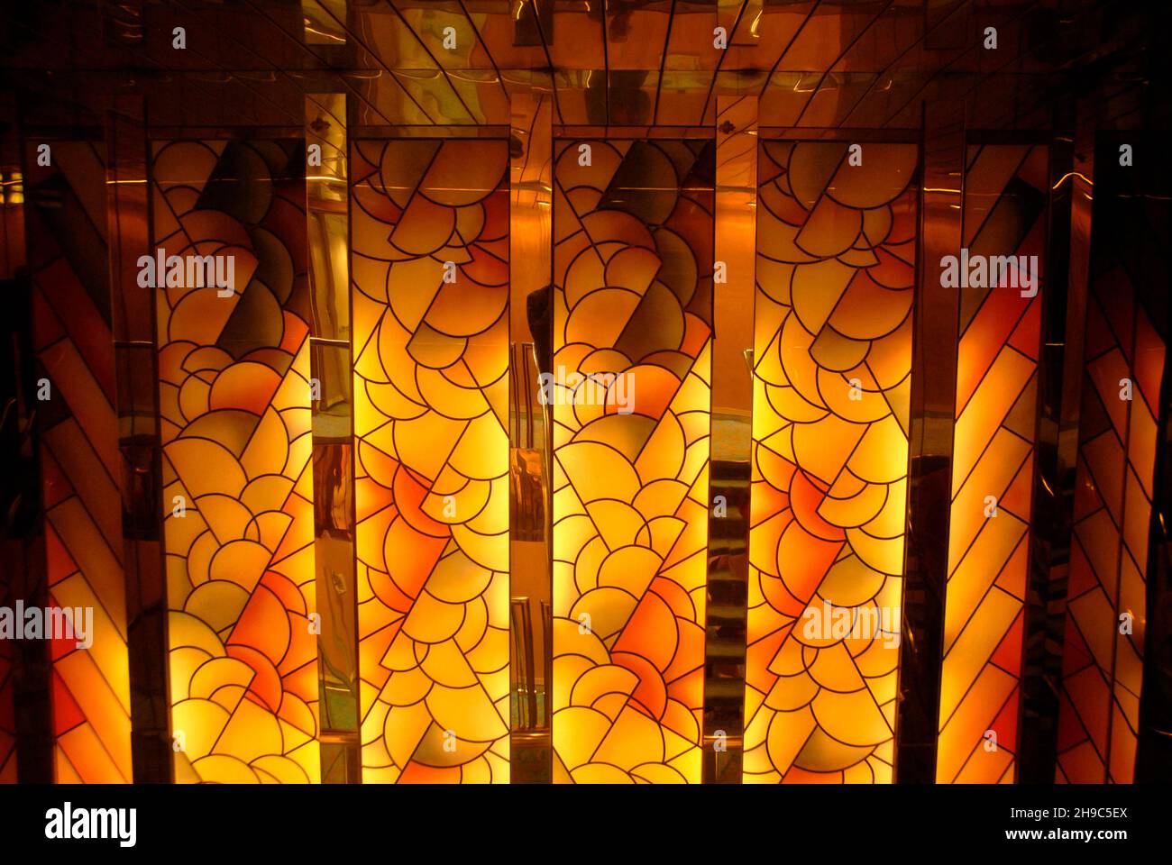 Abstract of light shining through translucent patterned glass on cruise ...