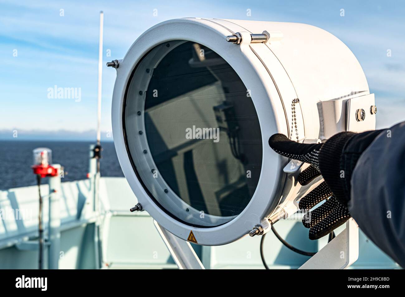 Ship's bell and signal light on the ship Stock Photo - Alamy