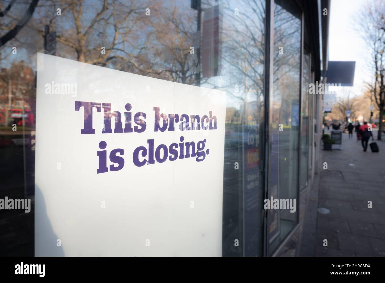 Sign in high street shop window ' This Branch is Closing ...