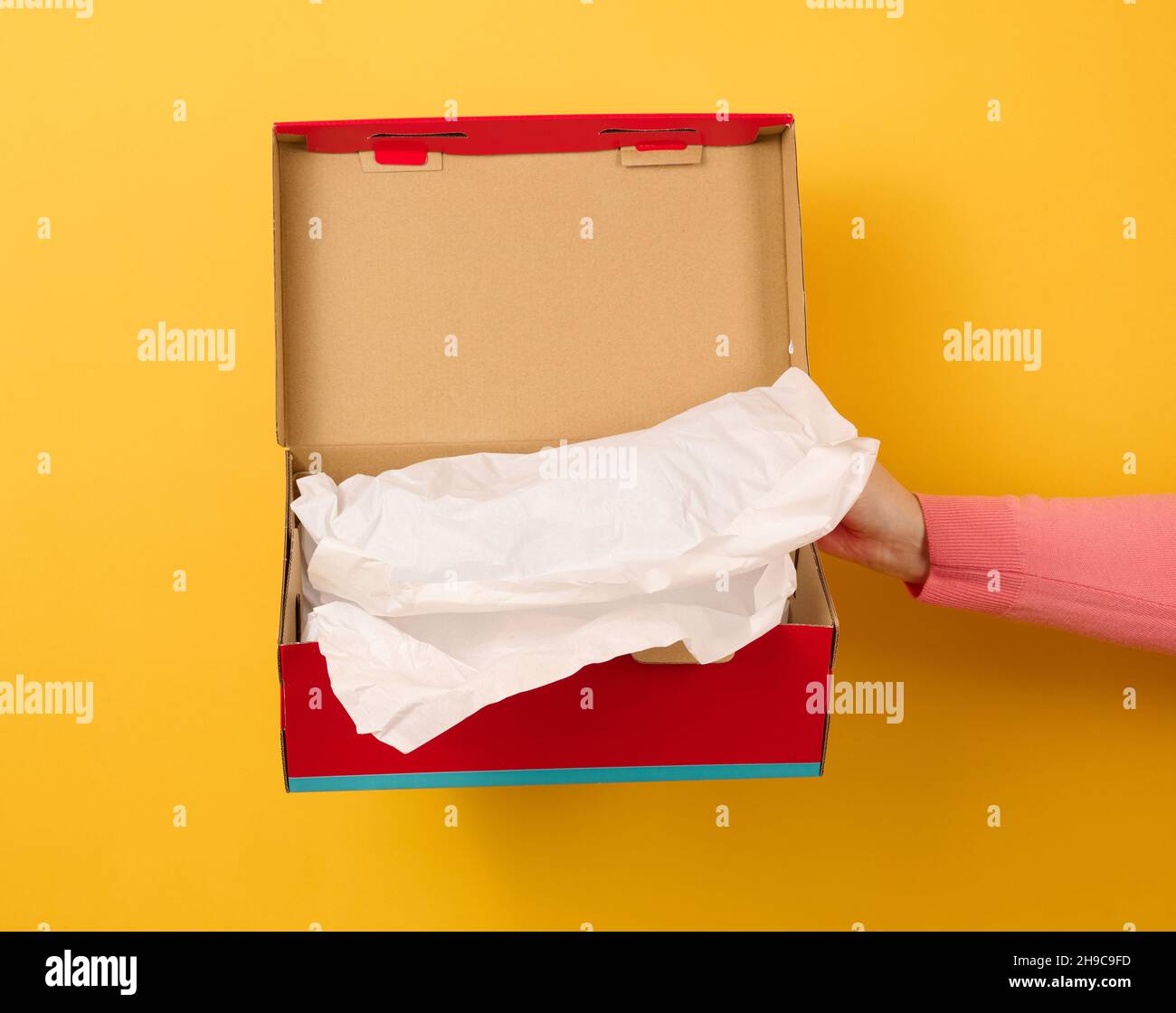 Woman hand open pink box hi-res stock photography and images - Alamy