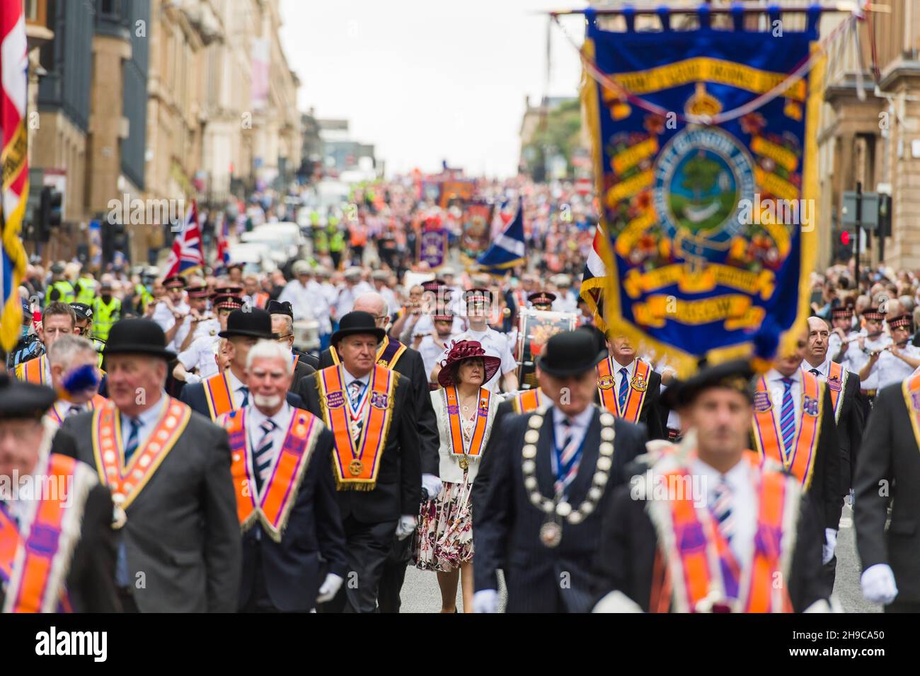 Thousands of members march down West George street as the Orange ...
