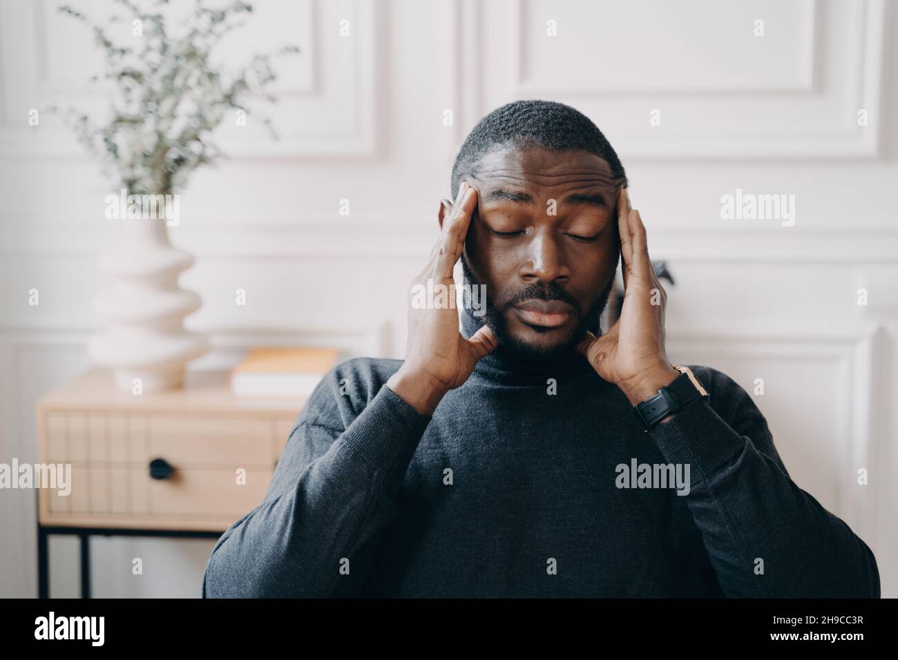 Stressed young african man employee with frustrated face expression ...