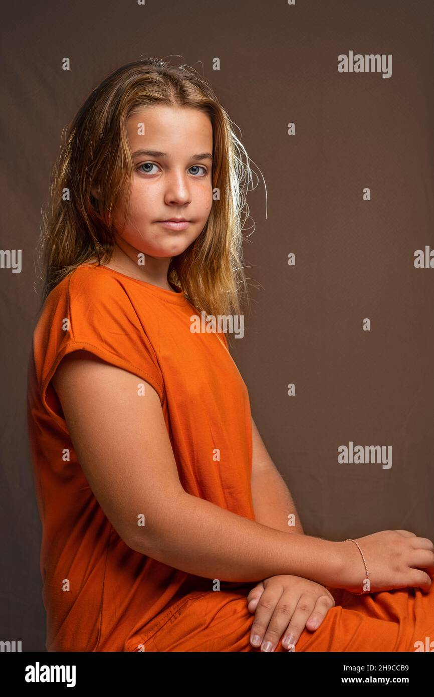 Orange dress teenager hi-res stock photography and images - Alamy