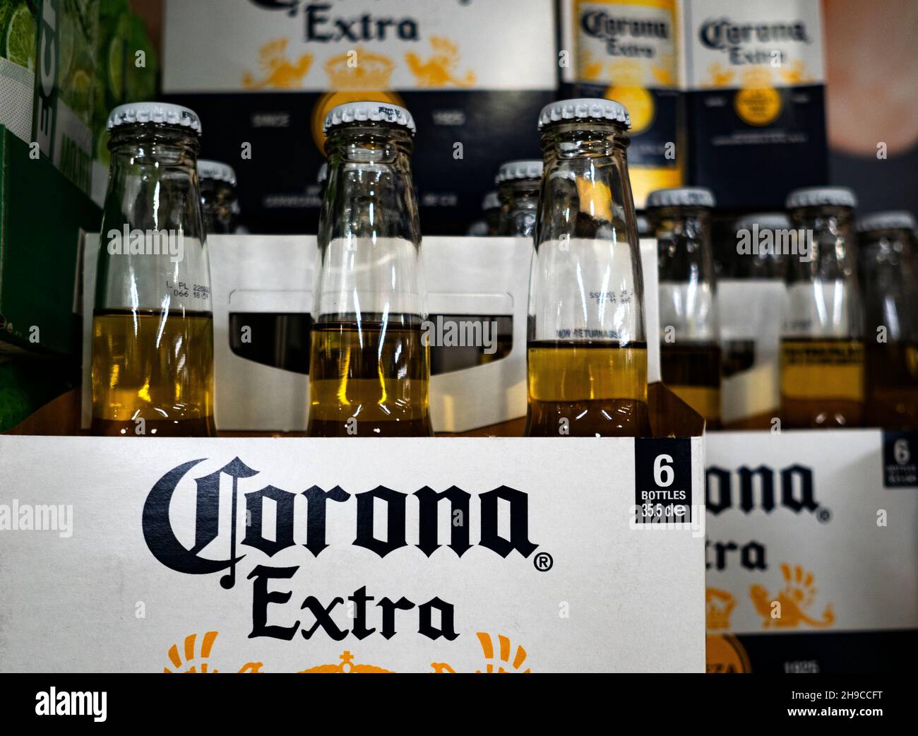 Corona beer bottles on store shelf. Corona extra Lager Beer is the ...