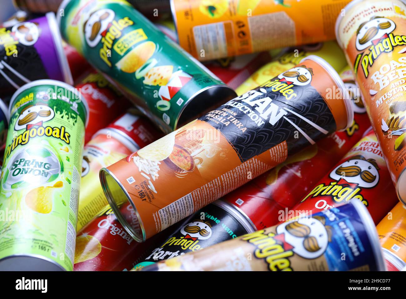 KHARKOV, UKRAINE - MARCH 30, 2021: Many Pringles cylinder chips boxes ...