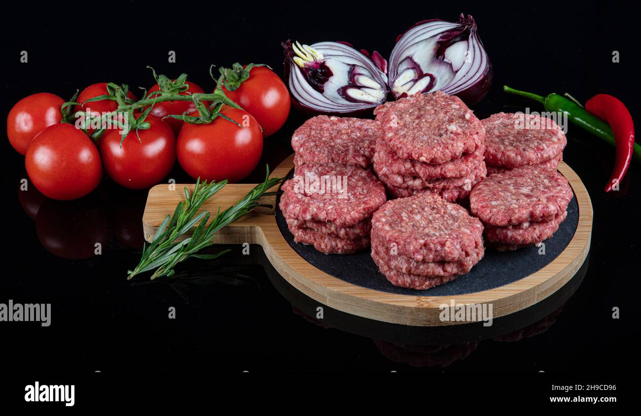 Raw beef meatballs made with various homemade spicy, beef kofta kofta ...