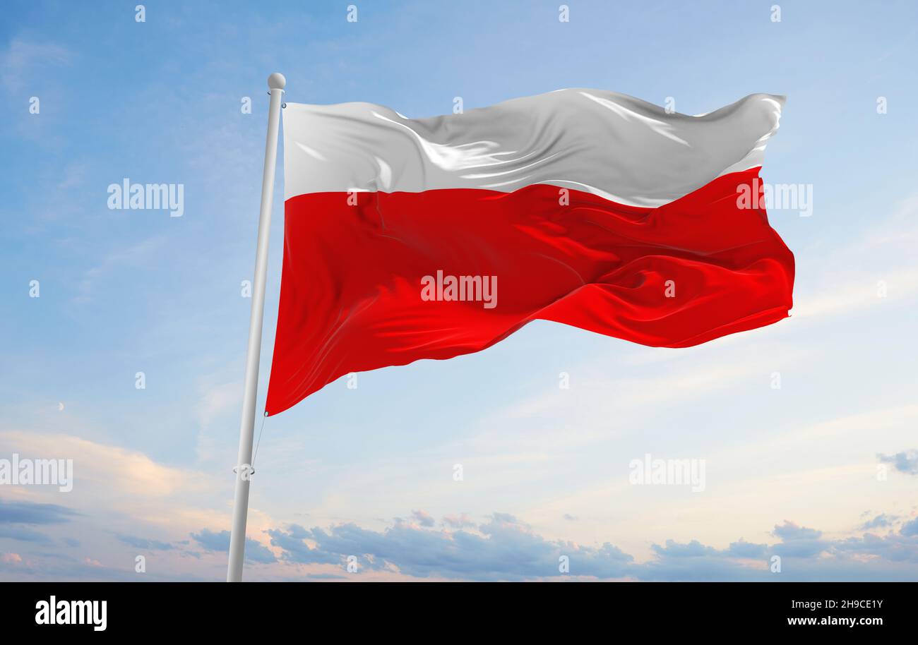 flag of Lausanne , Switzerland at cloudy sky background on sunset ...