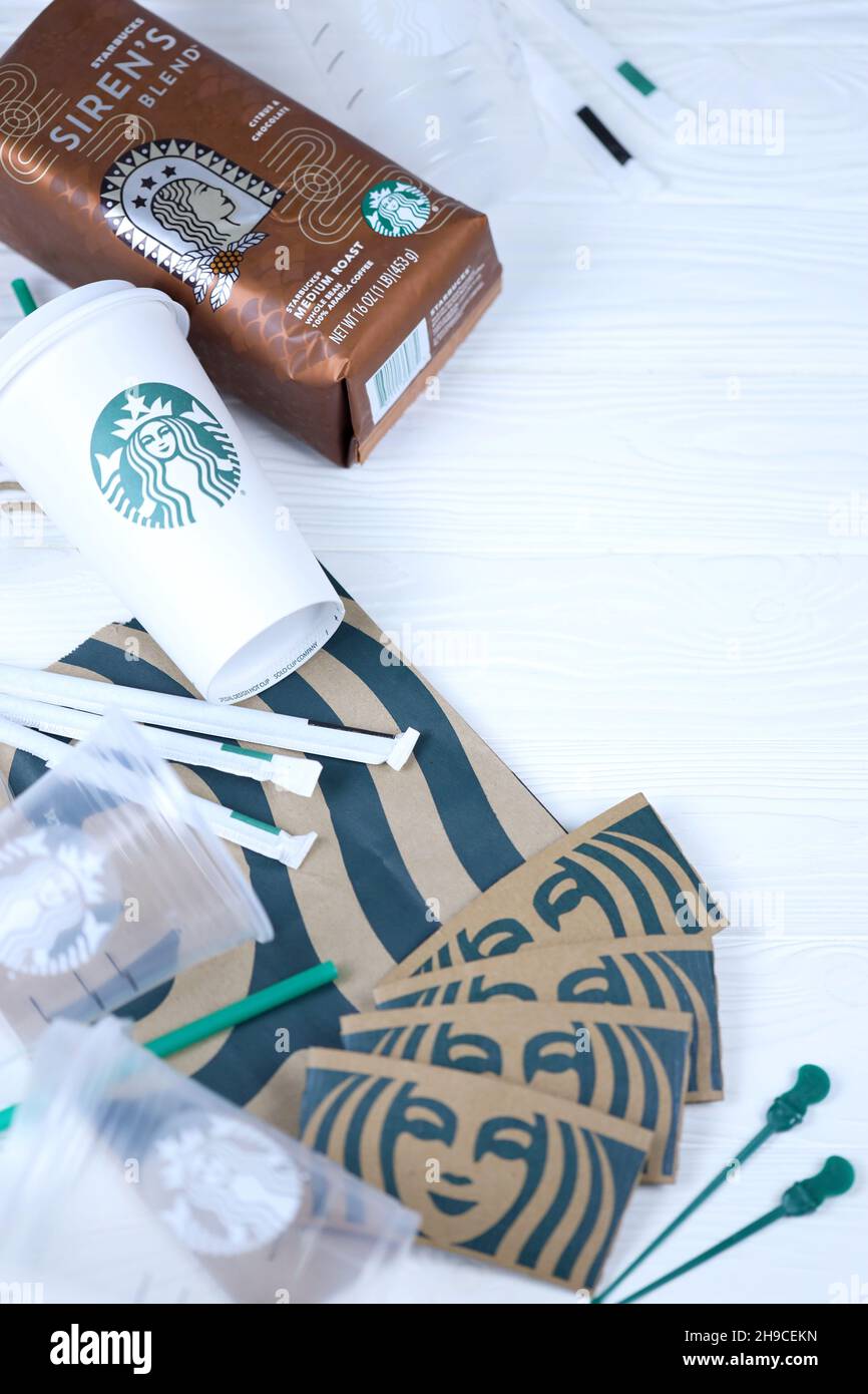 KHARKOV, UKRAINE - MARCH 15, 2021: Starbucks production on white wooden ...