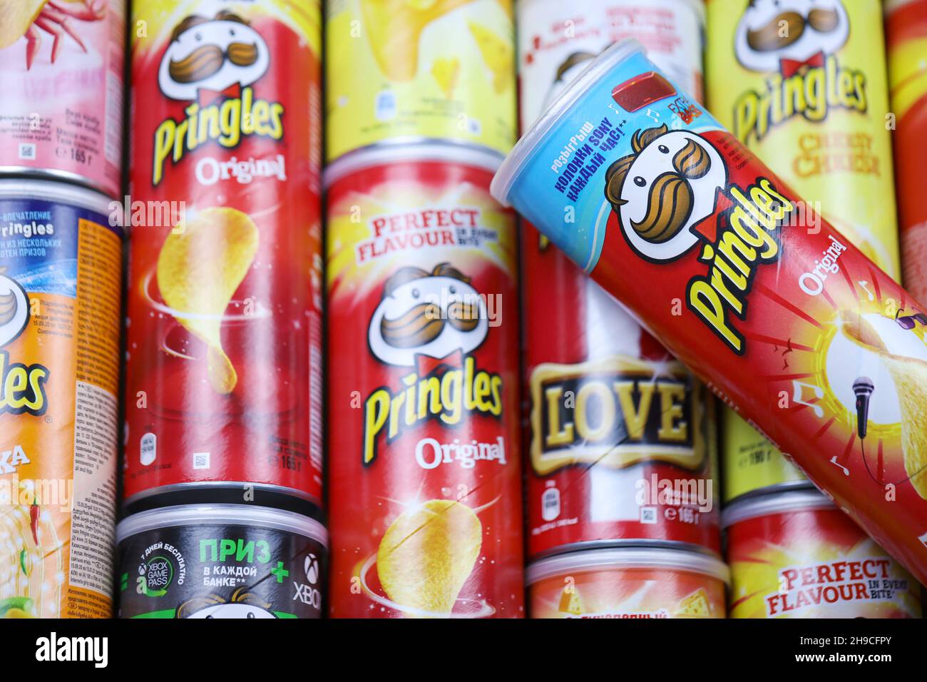 KHARKOV, UKRAINE - MARCH 30, 2021: Many Pringles cylinder chips boxes ...